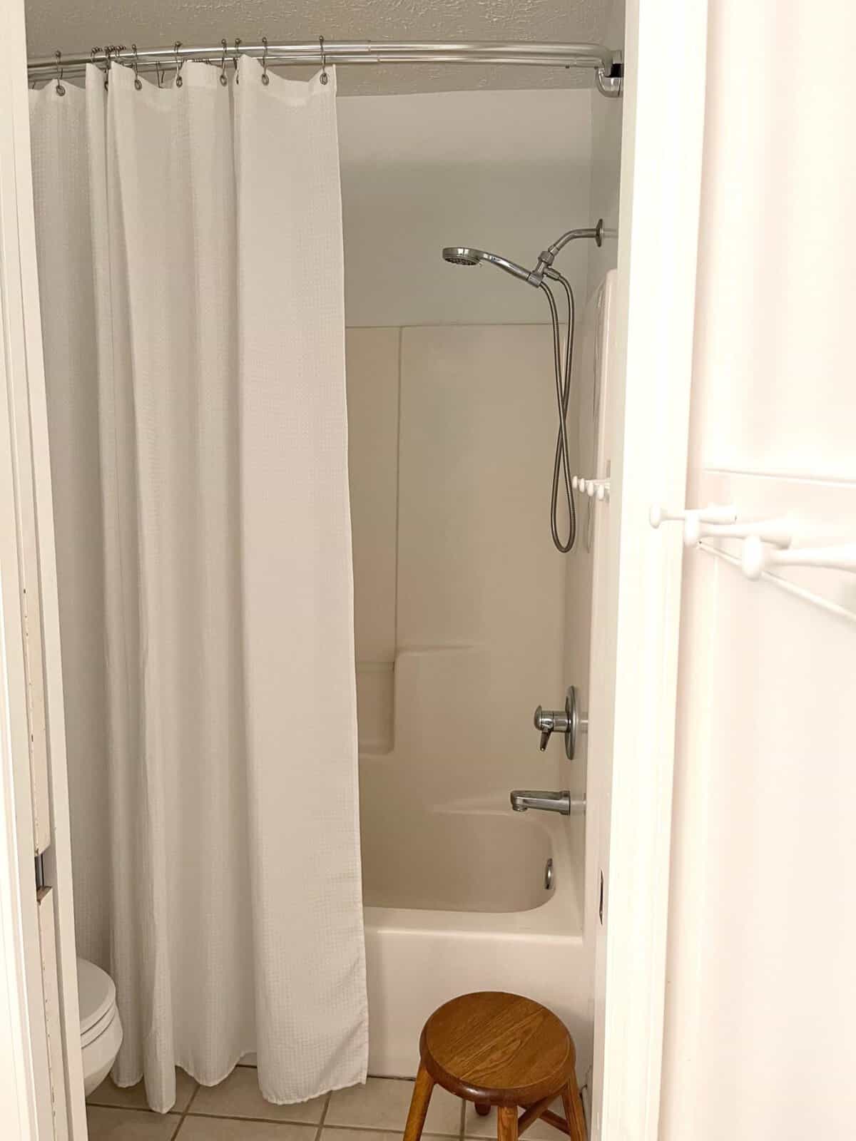 Replacing a Dated Glass Shower Door with a Double Rod and Curtains ...